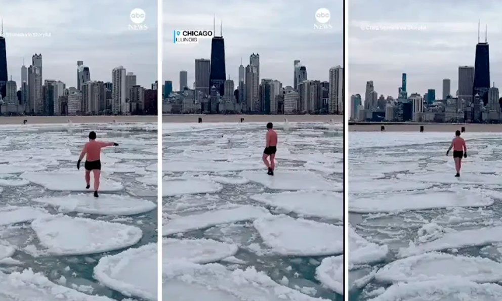 Hombre camina sobre el congelado lago Michigan